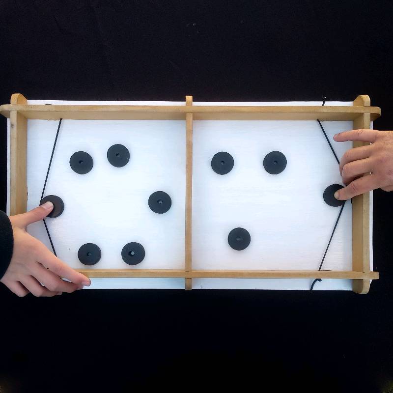 Tejo de mesa Slingpuck Mini Tejo en Rio Segundo