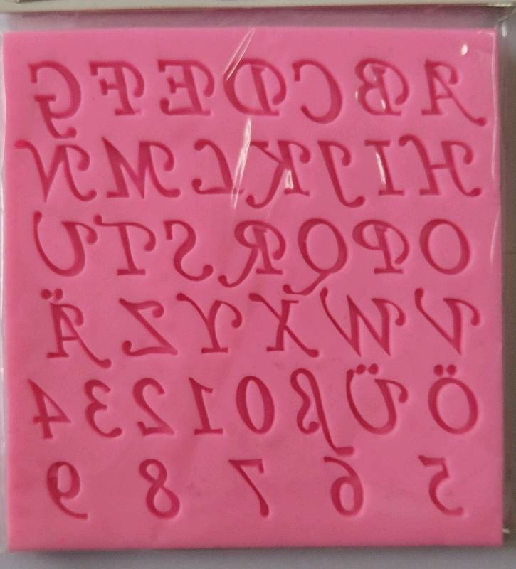 Letras mayúsculas cursivas en Arequipa