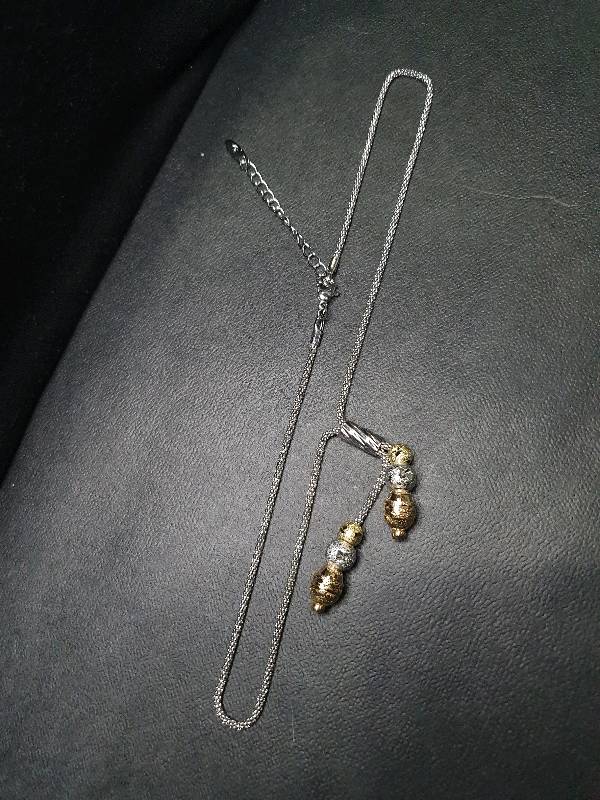 Collar dije tres oros en Ciudad de Guatemala