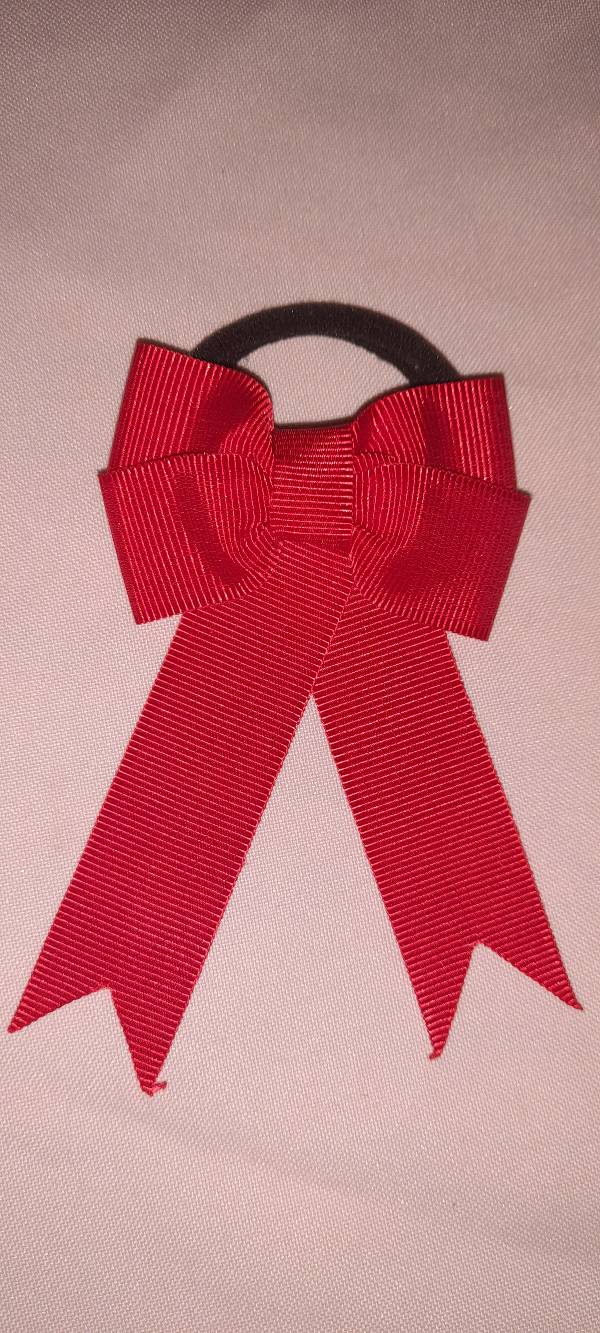 Cola Moño rojo en Castelar